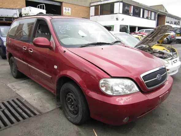 Kia Carnival II 2.5i -A- Maroon. Carnival wrecker | New Model Wreckers